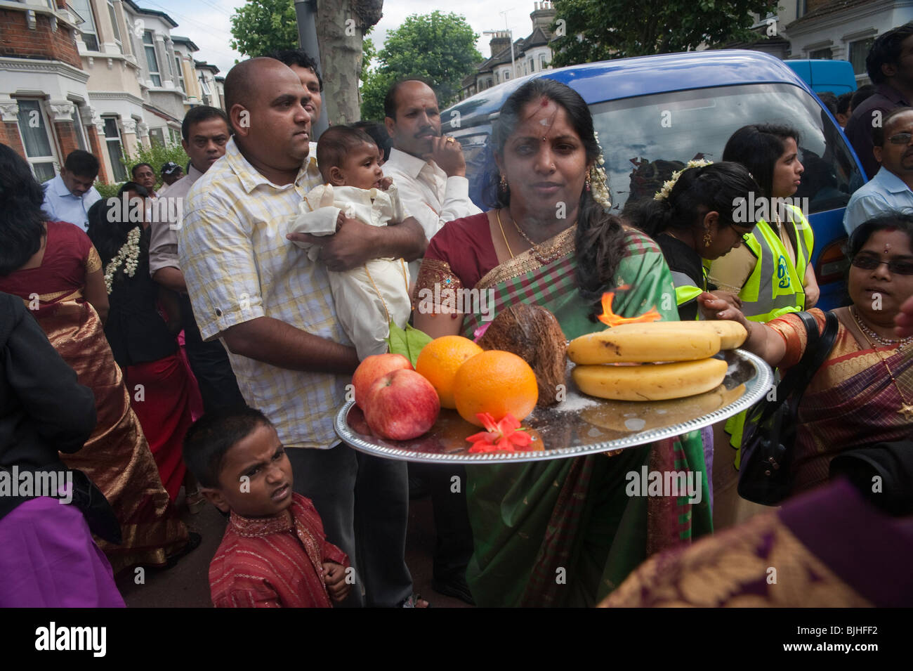 South Indian Hindus in East London take part in a traditional 'Ther ...