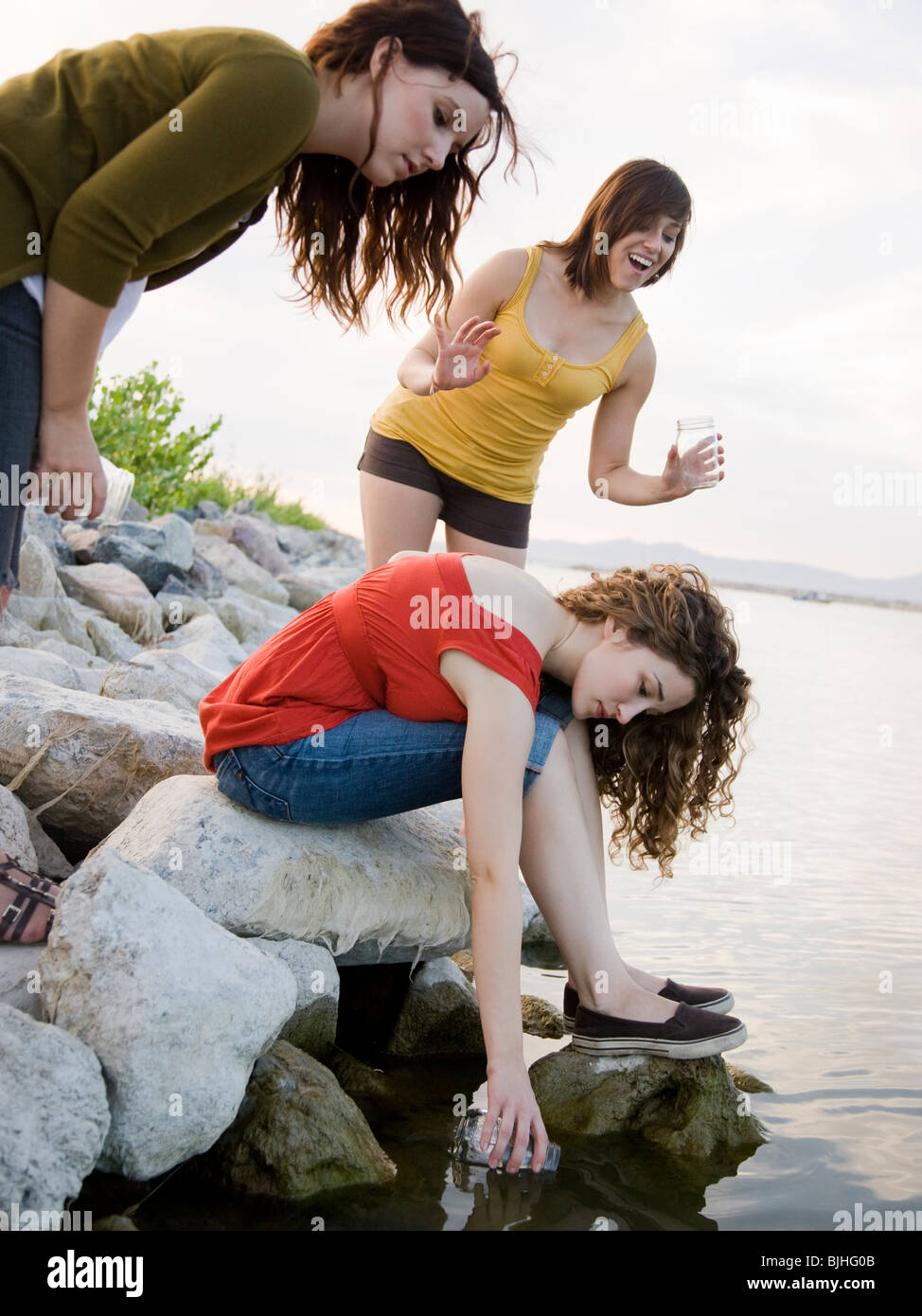 girlfriends by the lake Stock Photo - Alamy