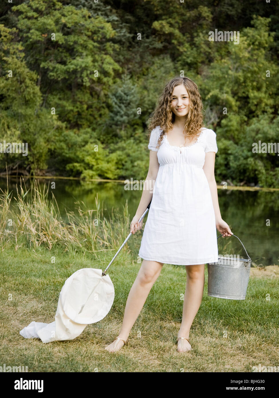 Young woman catching net hi-res stock photography and images - Alamy