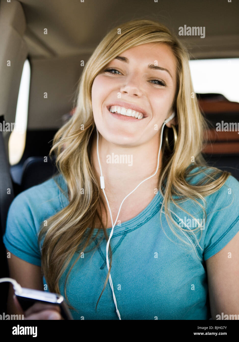 Woman ipod car hi-res stock photography and images - Alamy