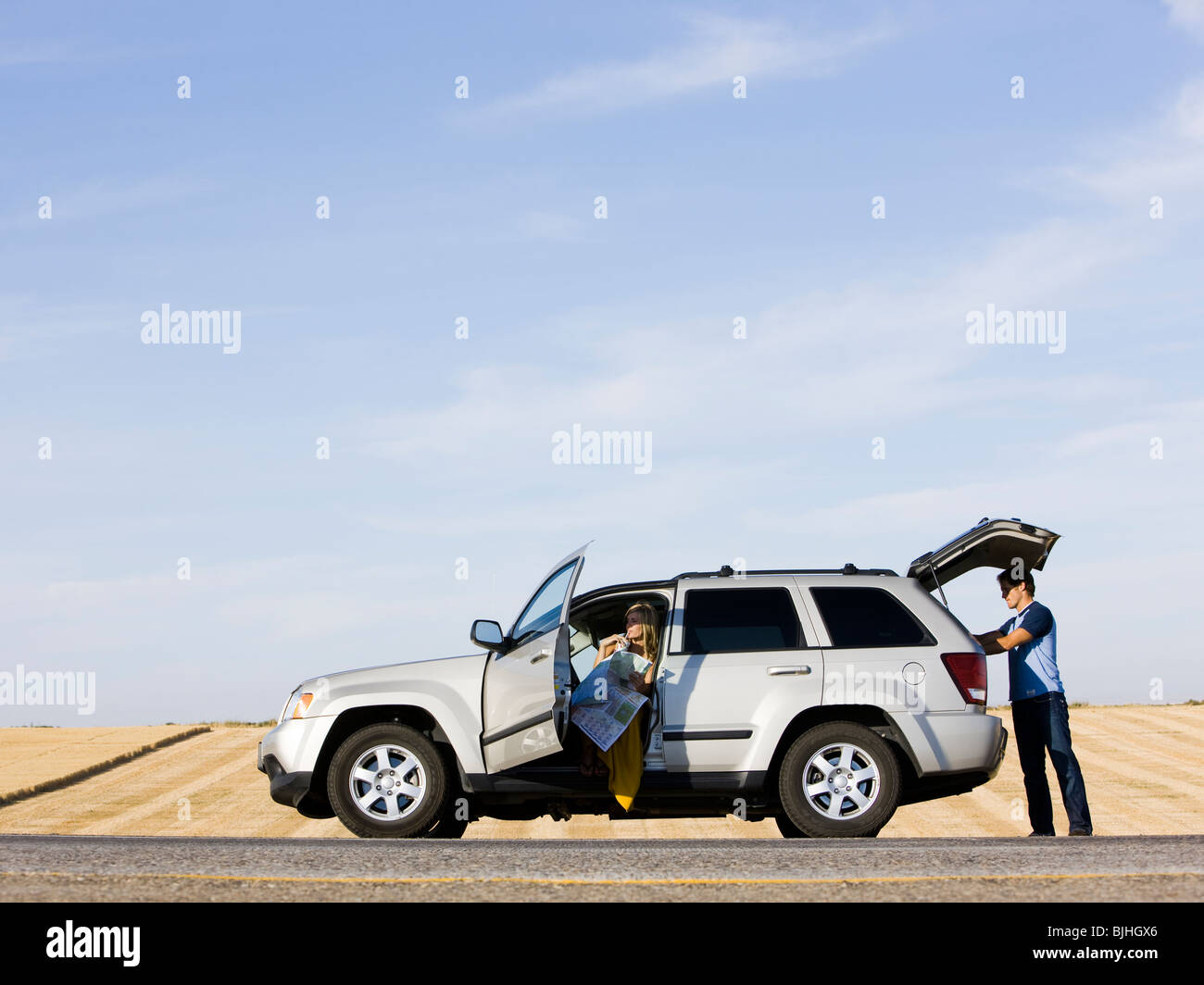 Car driving over map hi-res stock photography and images - Alamy