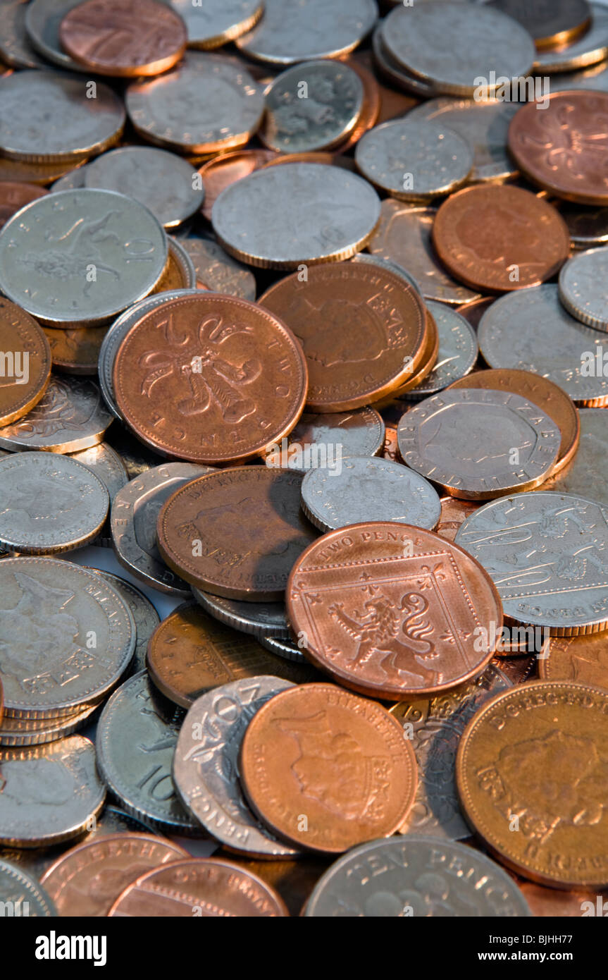 Table full of loose change in sterling Stock Photo - Alamy
