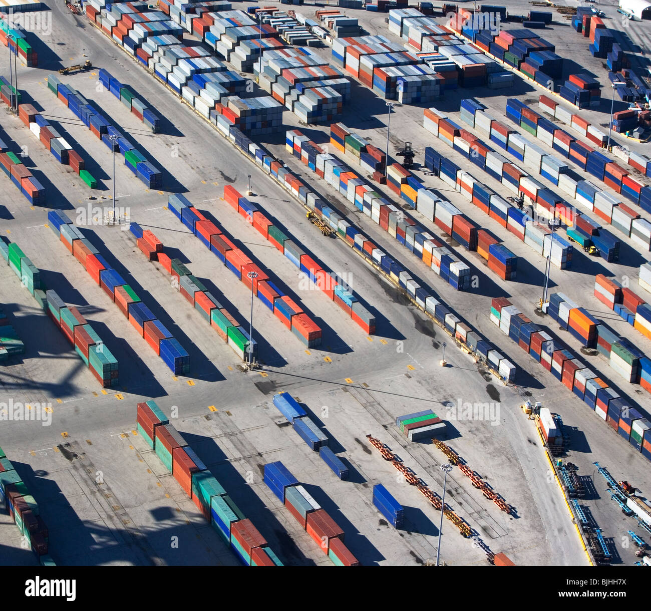 Shipping containers at commercial dock Stock Photo - Alamy