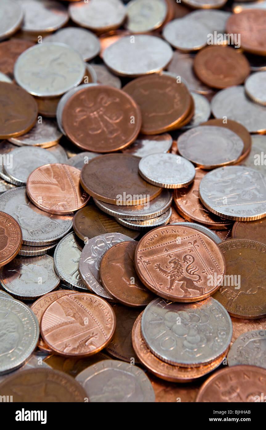 Table full of loose change in sterling Stock Photo - Alamy