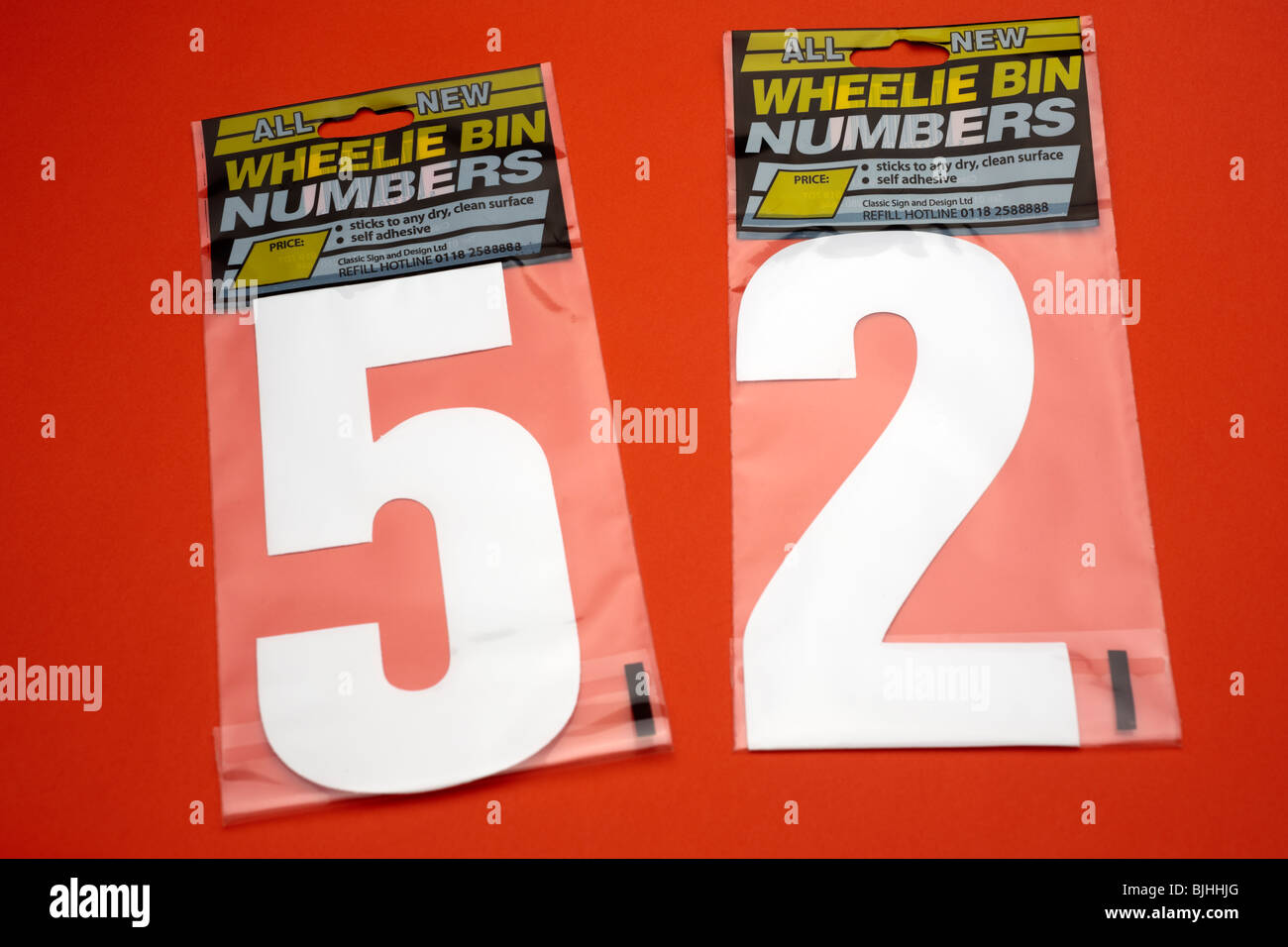 Two packs of wheelie bin numbers fifty two Stock Photo - Alamy