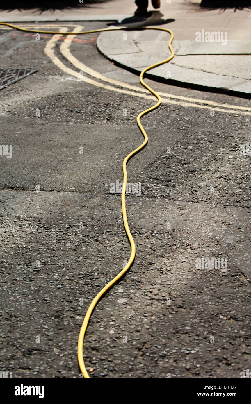 hose pipe on road Stock Photo - Alamy