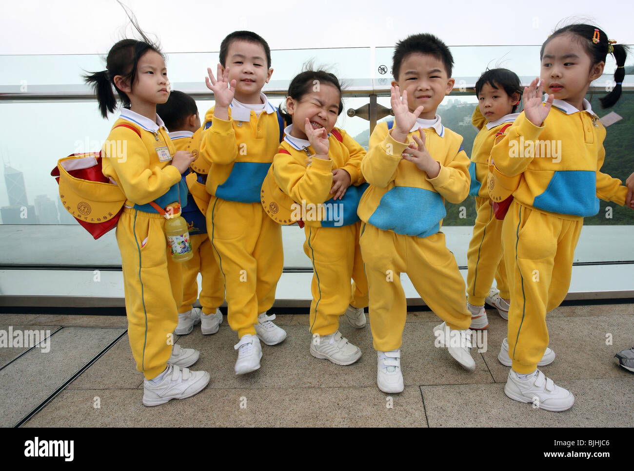 Happy children posing, Hong Kong, China Stock Photo - Alamy