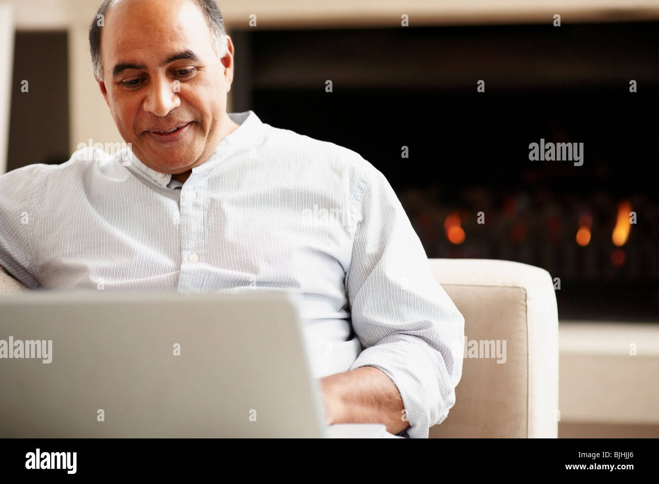 Man working on laptop Stock Photo - Alamy