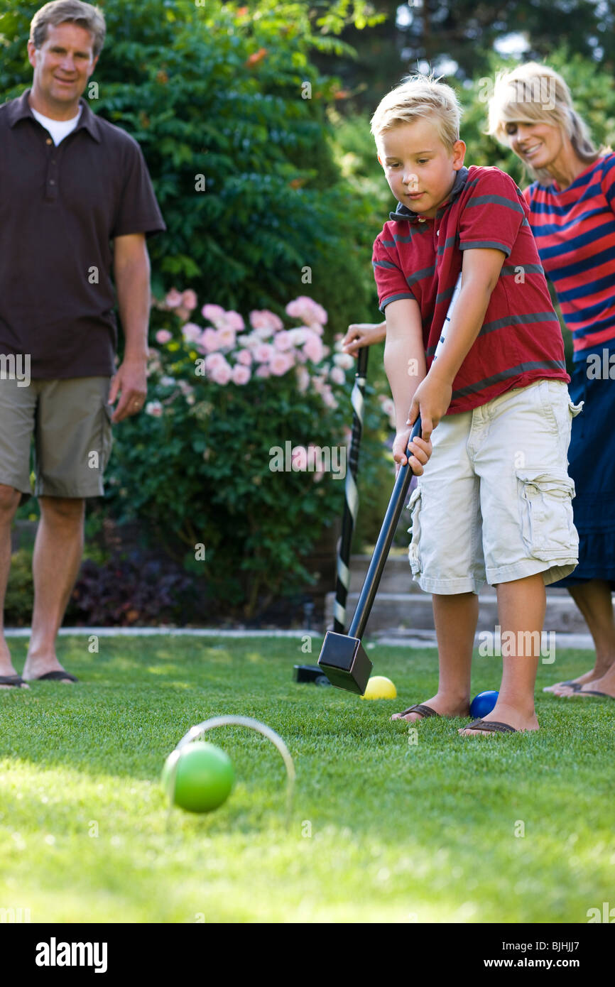 Child playing croquet hi-res stock photography and images - Alamy