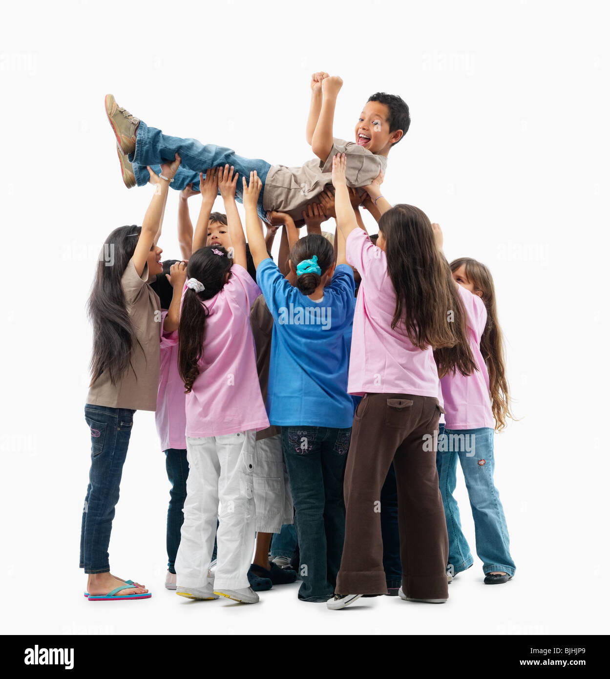 Children lifting one child Stock Photo - Alamy