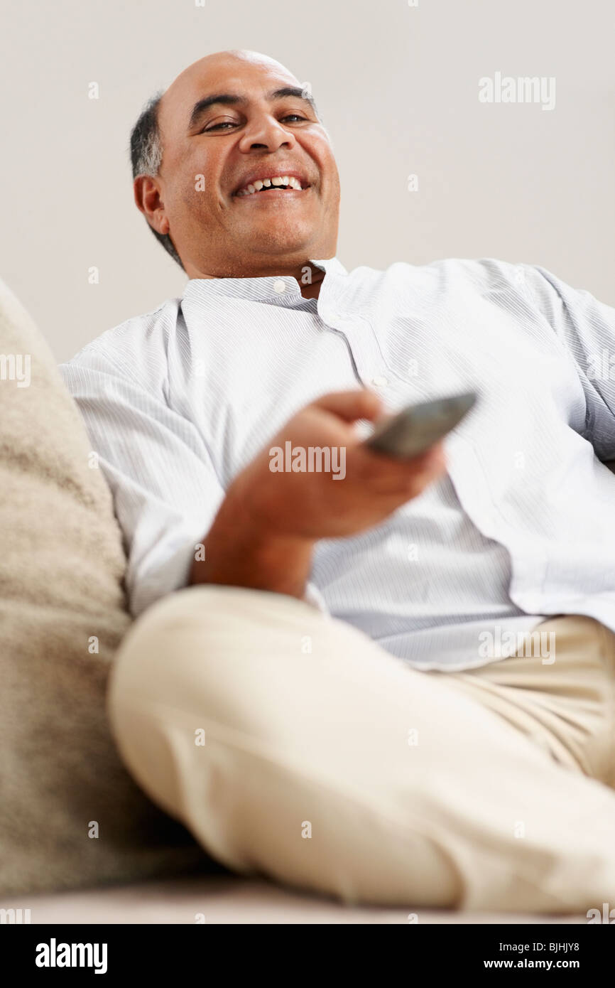 Man watching television Stock Photo - Alamy