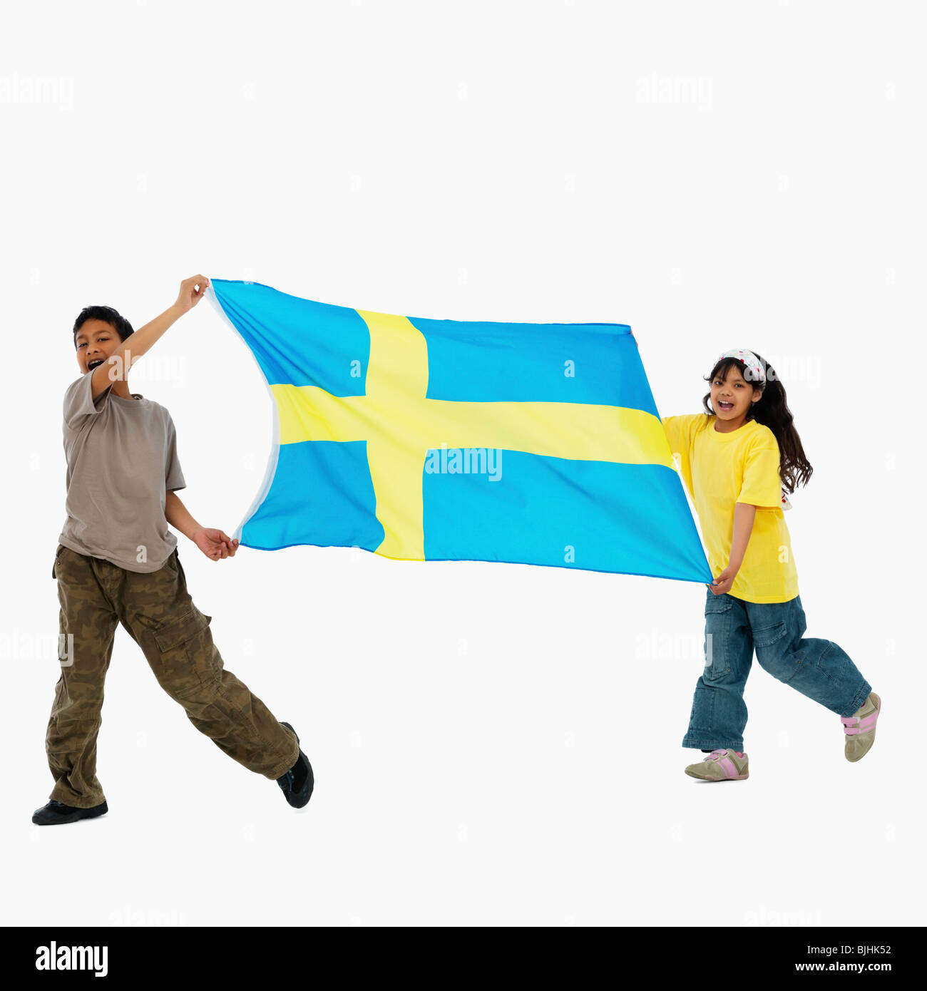 Children carrying flag Stock Photo - Alamy