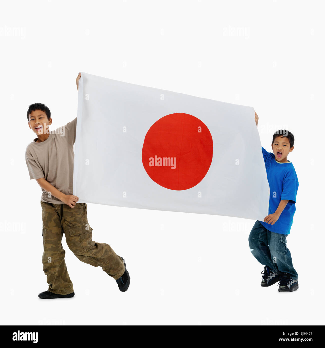 Two Boys Carrying Flag High Resolution Stock Photography and Images - Alamy