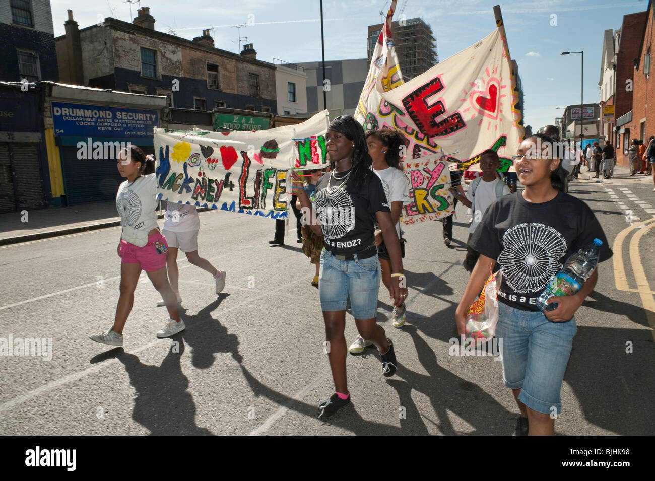 Hackney march against gun and knife crime - banners and young black ...