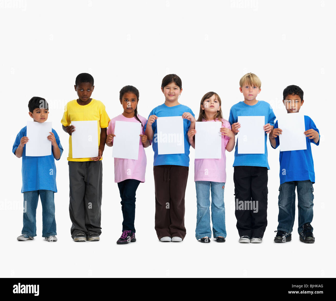 Children holding paper Stock Photo - Alamy