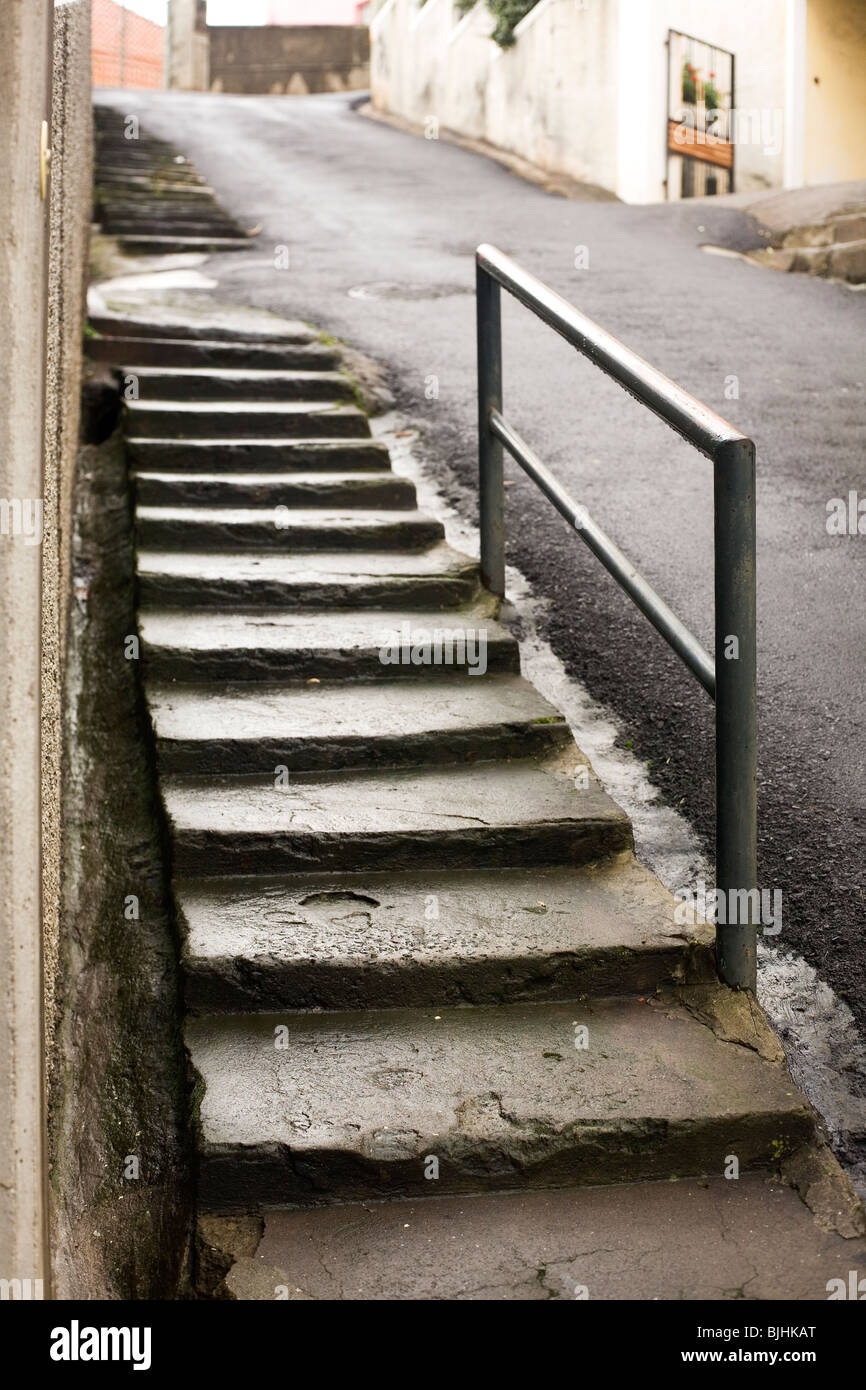 Steps lead up one of the steep hills in Funchal in Madeira Stock Photo ...