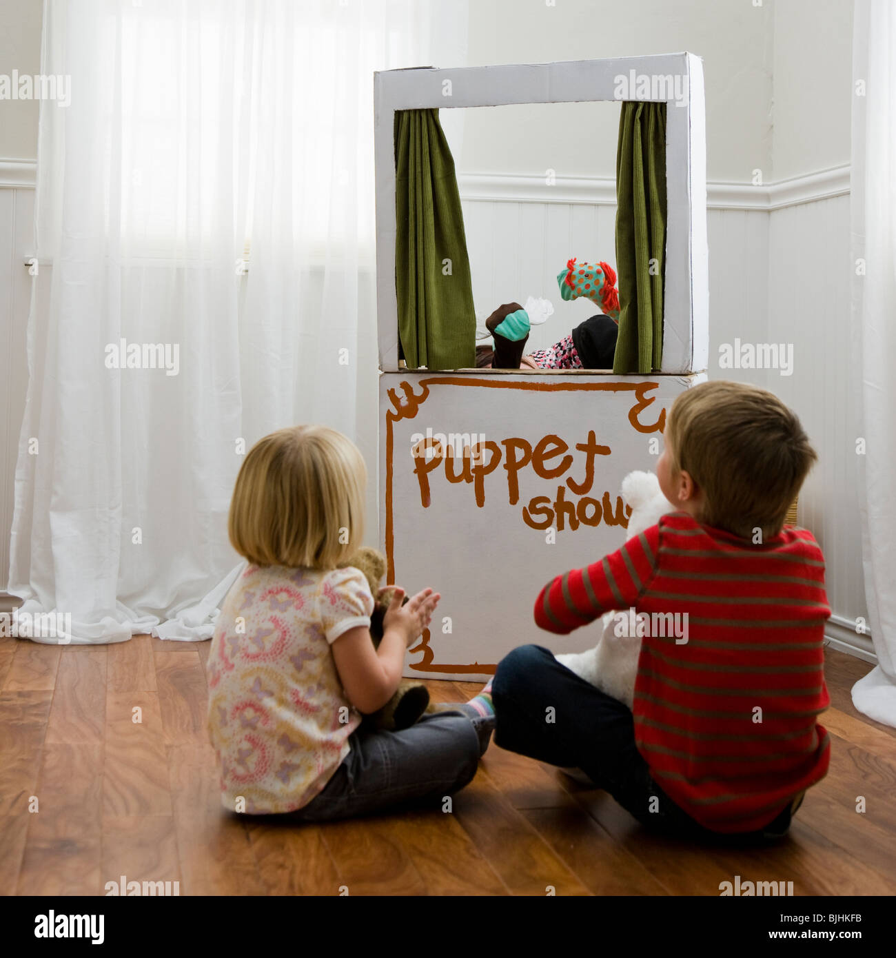 children watching a puppet show Stock Photo - Alamy