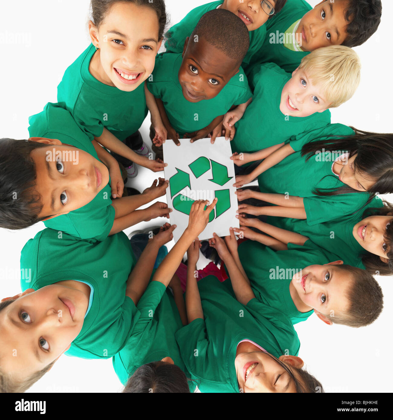 Happy kids team recycling hi-res stock photography and images - Alamy