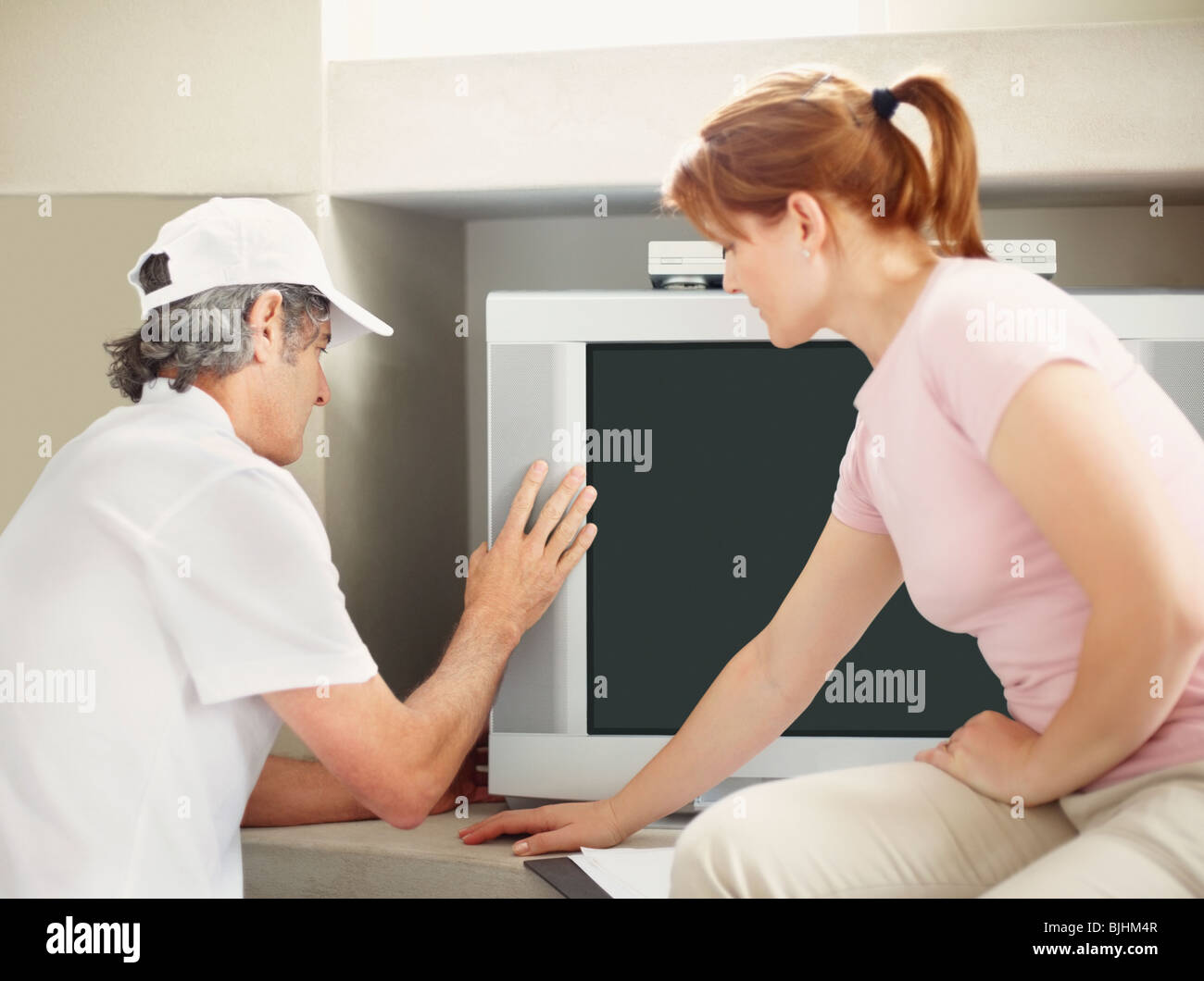 Fixing a computer Stock Photo - Alamy