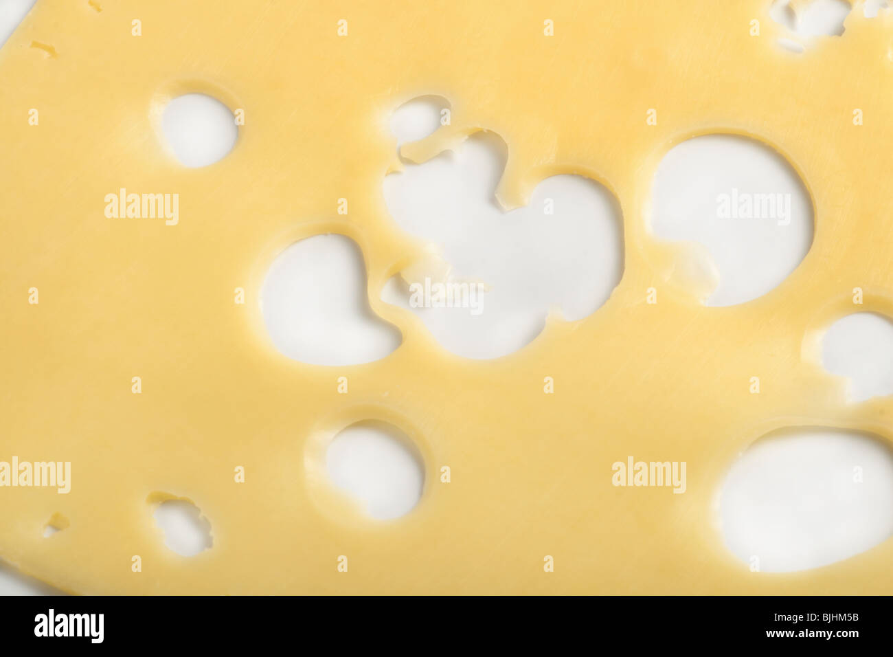 Slice of emmenthal cheese hi-res stock photography and images - Alamy