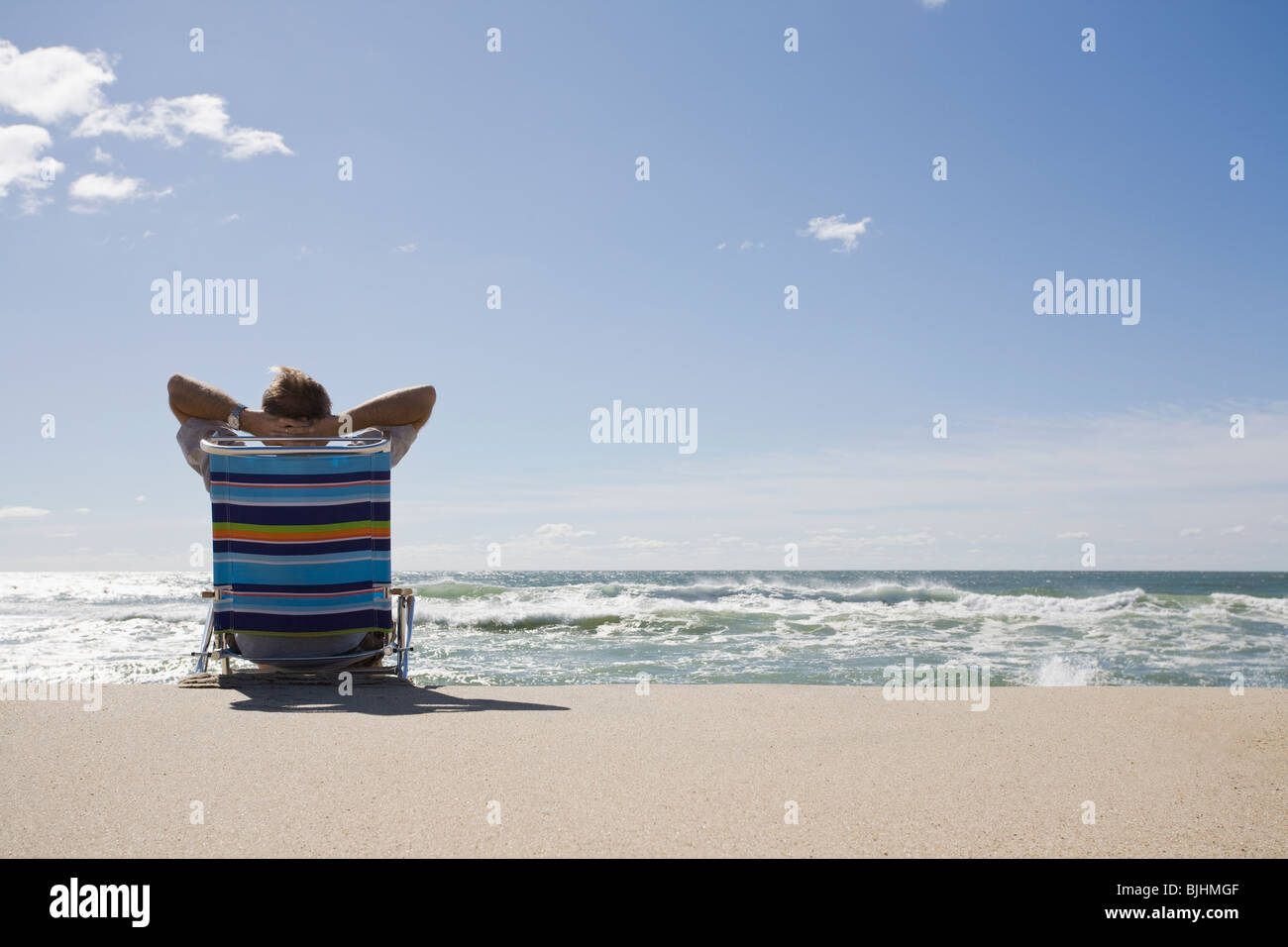 Relaxing on the beach Stock Photo - Alamy