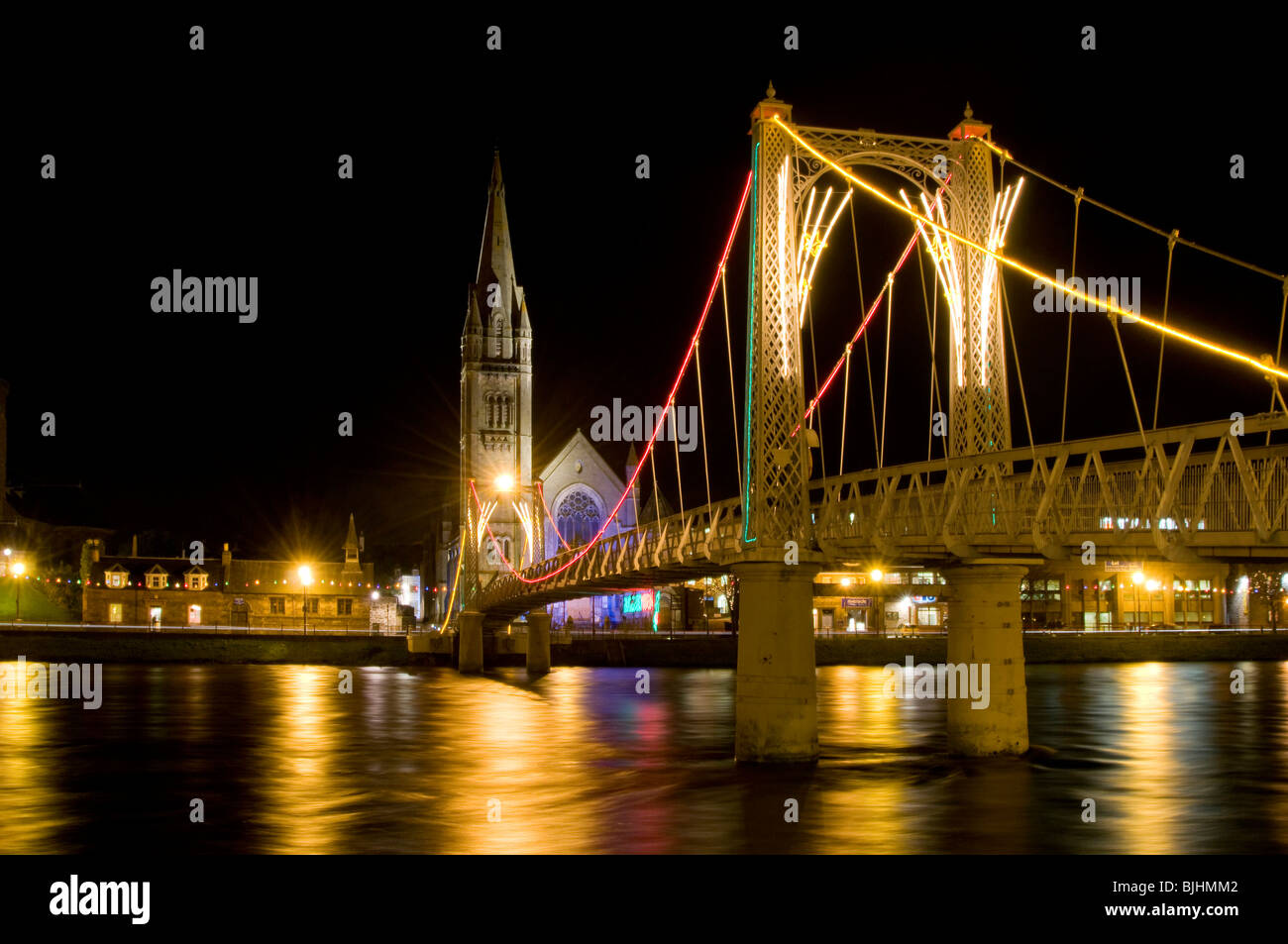 Inverness and River Ness with Suspension bridge by night Stock Photo ...