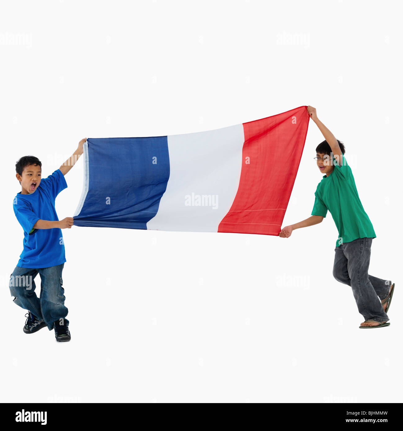 Children carrying flag Stock Photo - Alamy