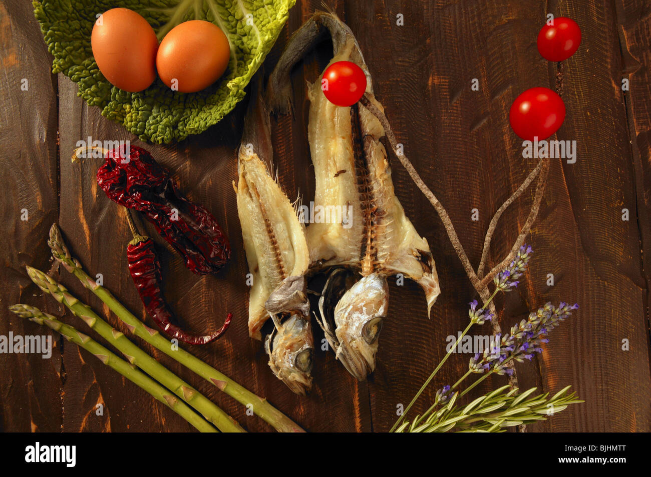Dried salted hake fish, asparagus, tomatoes, pepper and eggs Stock ...