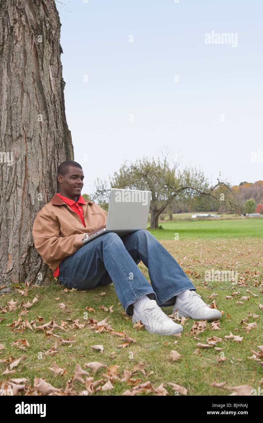 African male laptop outside hi-res stock photography and images - Alamy
