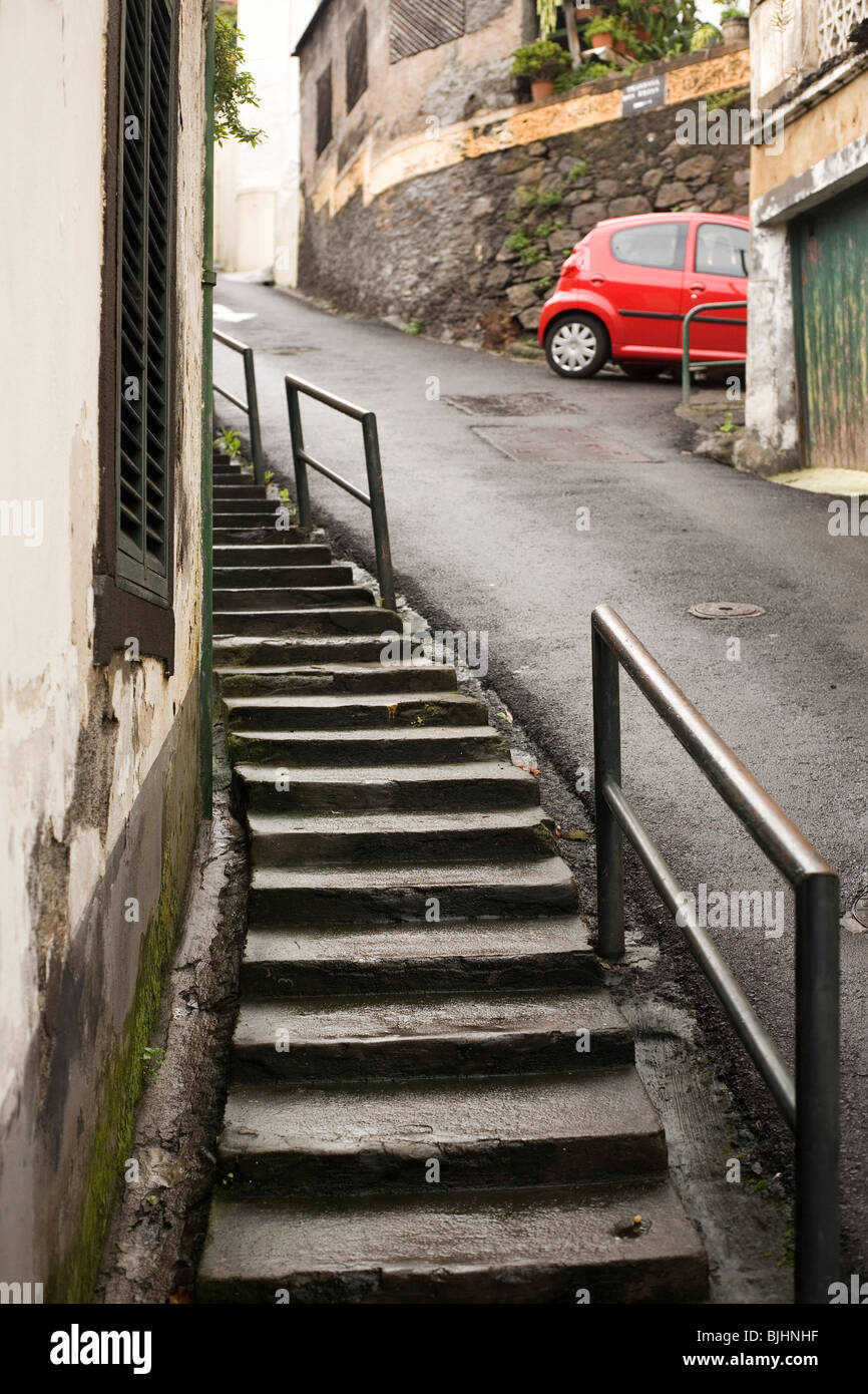 Steps lead up one of the steep hills in Funchal in Madeira Stock Photo ...