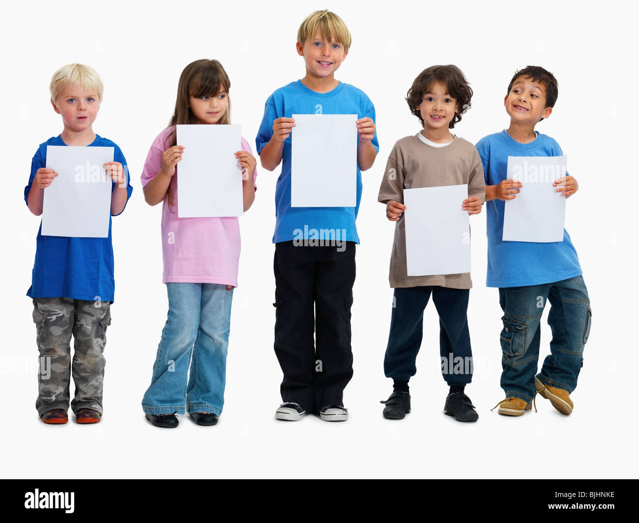 Children holding paper Stock Photo - Alamy