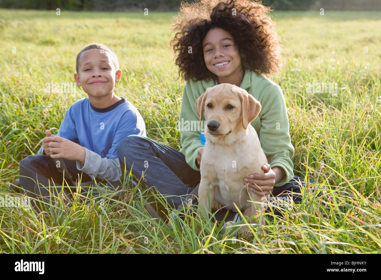 Children and dog Stock Photo - Alamy