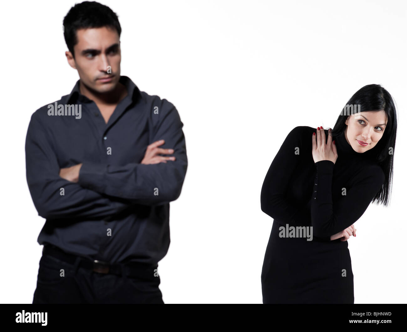 young couple on white background having a dispute Stock Photo - Alamy