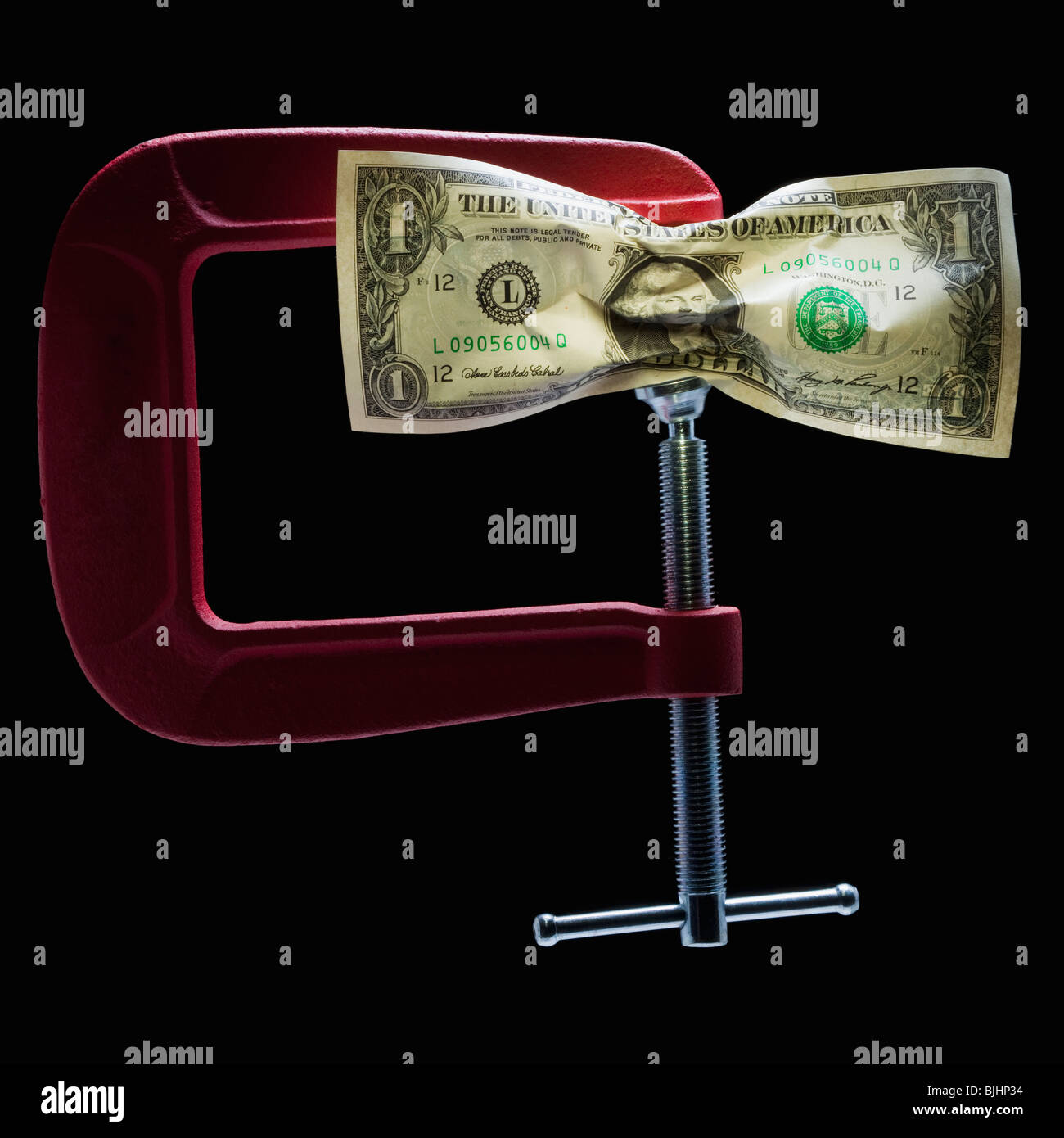 Dollar in clamp hi-res stock photography and images - Alamy