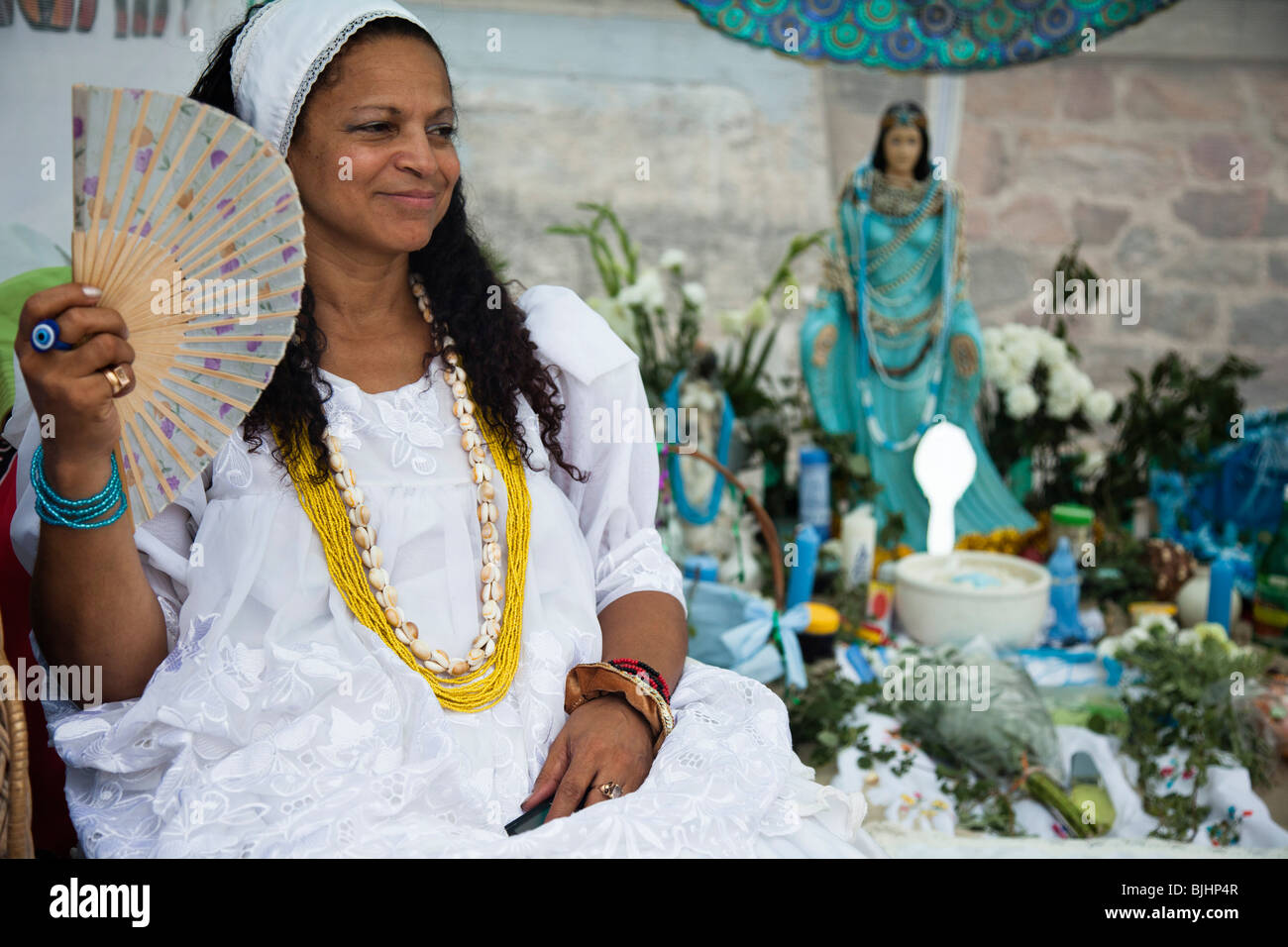 Priestess or "Mae" Susana Andrade on the "Day of Yemanja", goddess of ...