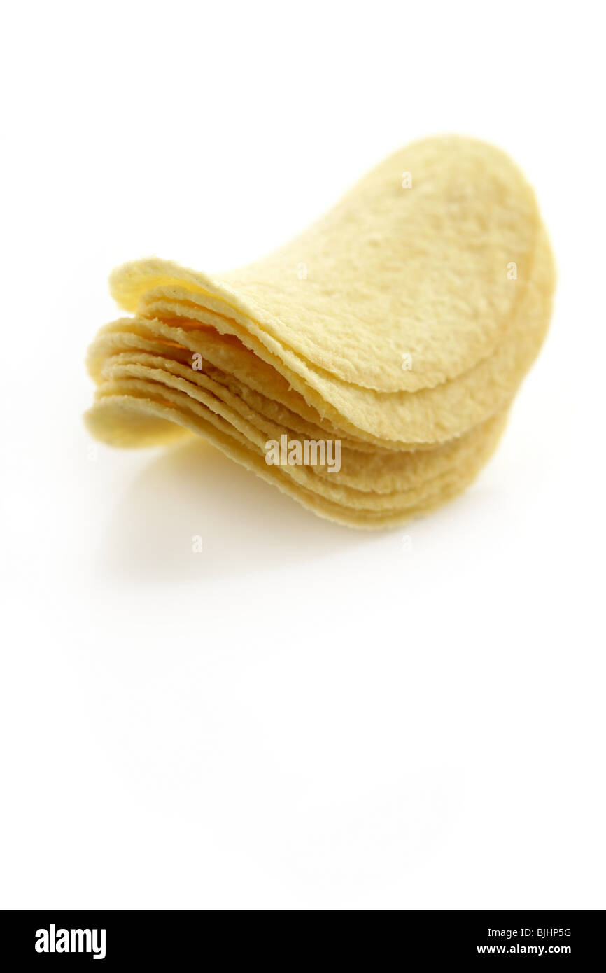 Potato salted chips slices over white background Stock Photo - Alamy