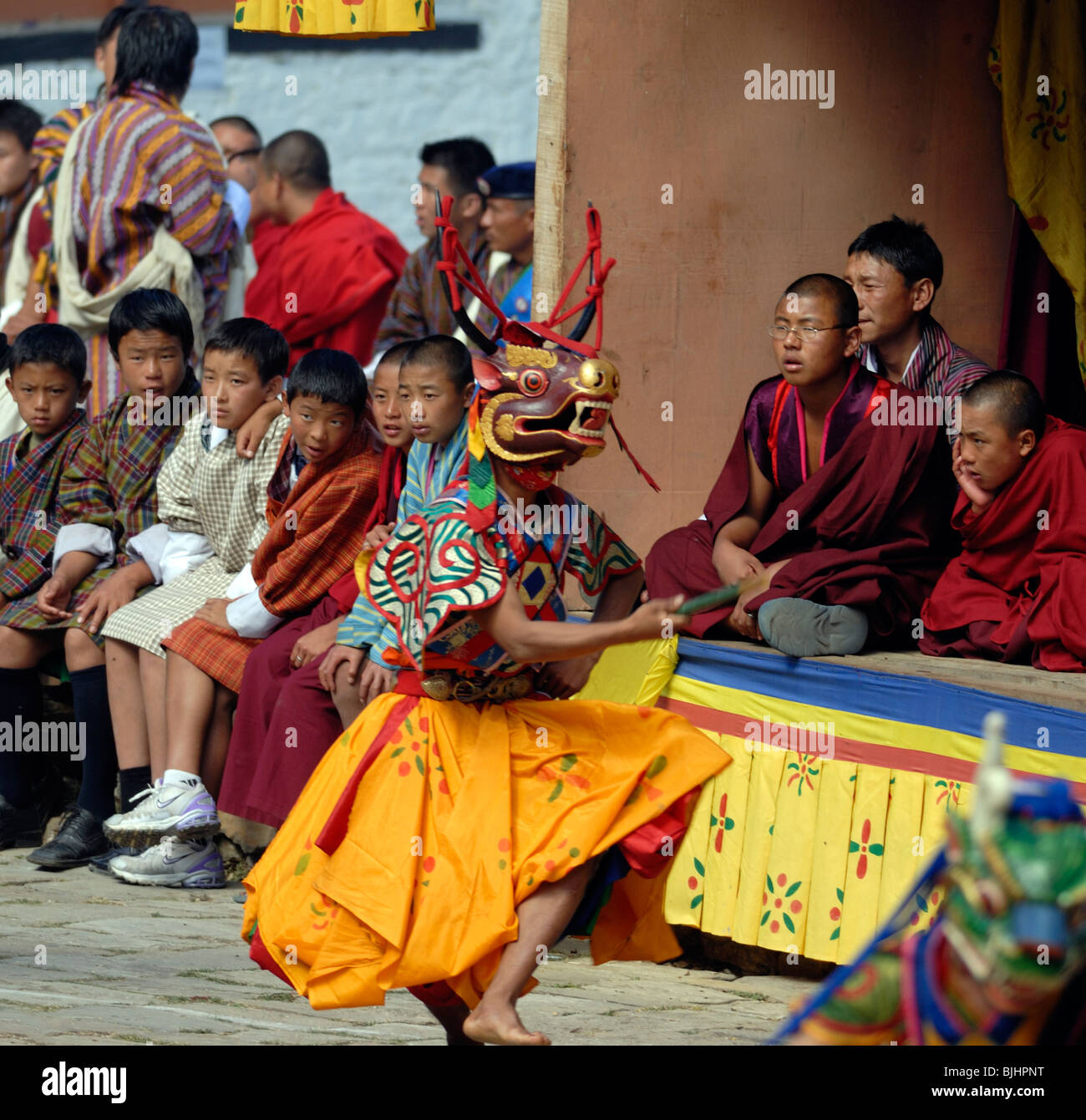 A monk dancer in a mask representing a deer dances in the courtyard of ...