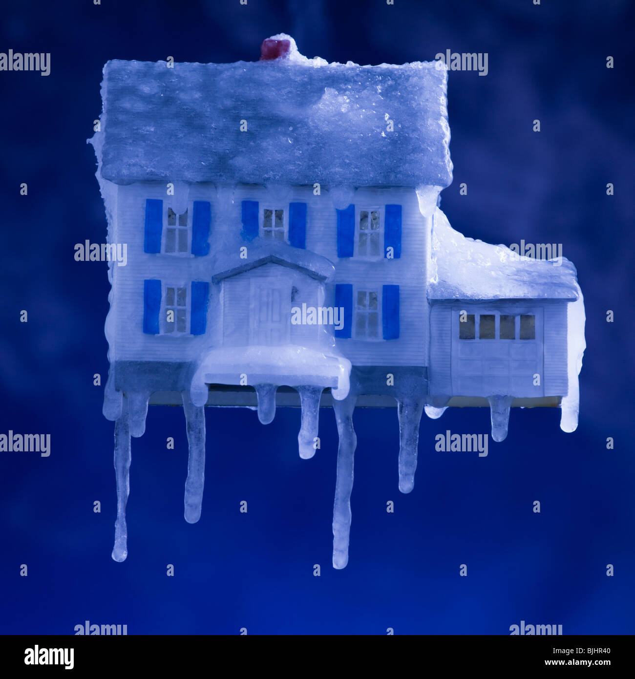 Model house covered in ice Stock Photo - Alamy
