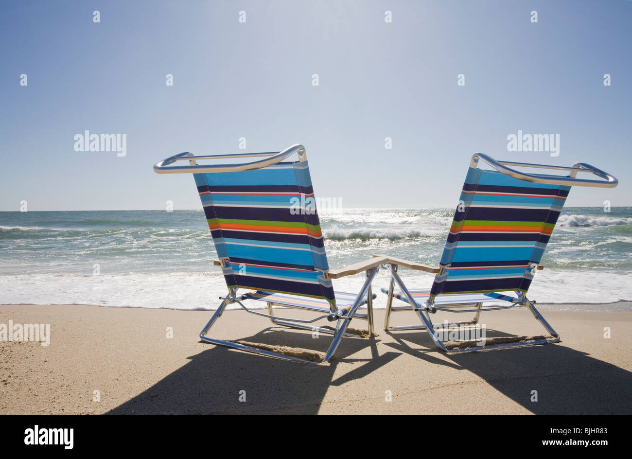 Beach with chairs hi-res stock photography and images - Alamy