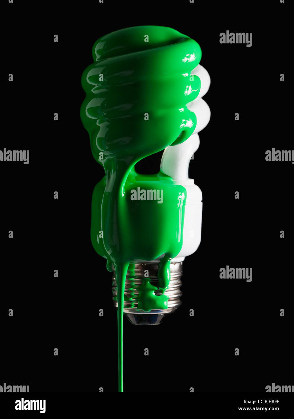 Light bulb covered in green paint Stock Photo - Alamy