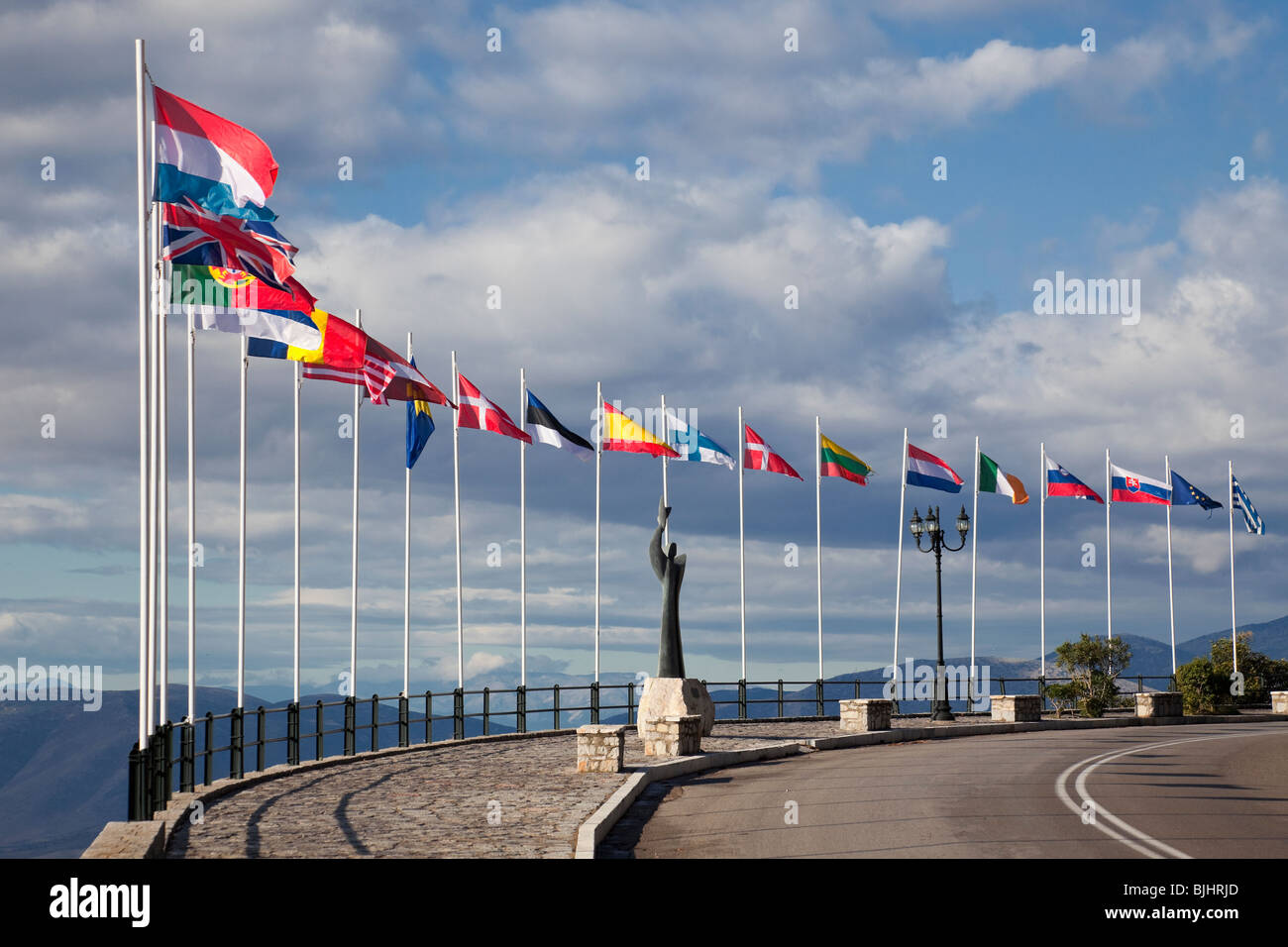 Modern monument to Prometheus with flags in Delphi,Greece Stock Photo ...