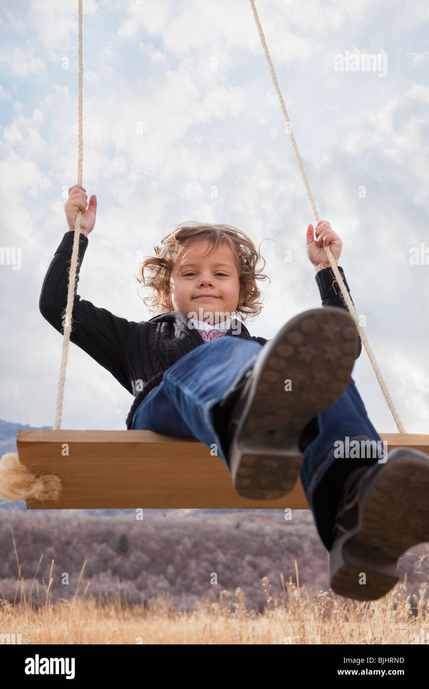 Child on swing Stock Photo - Alamy