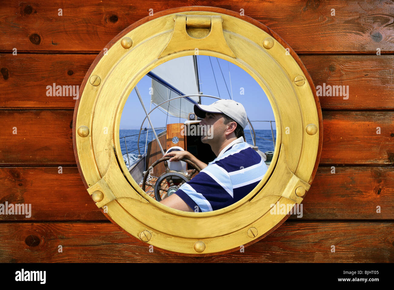 Sailor on sailboat summer holidays view from boat round window Stock ...