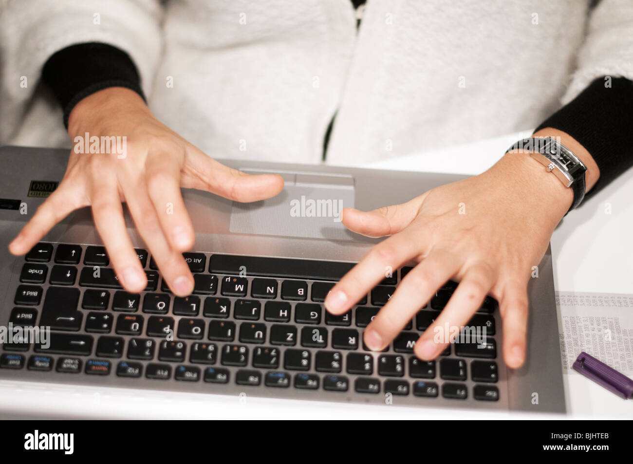 Woman typing on a laptop keyboard-close-up Stock Photo - Alamy
