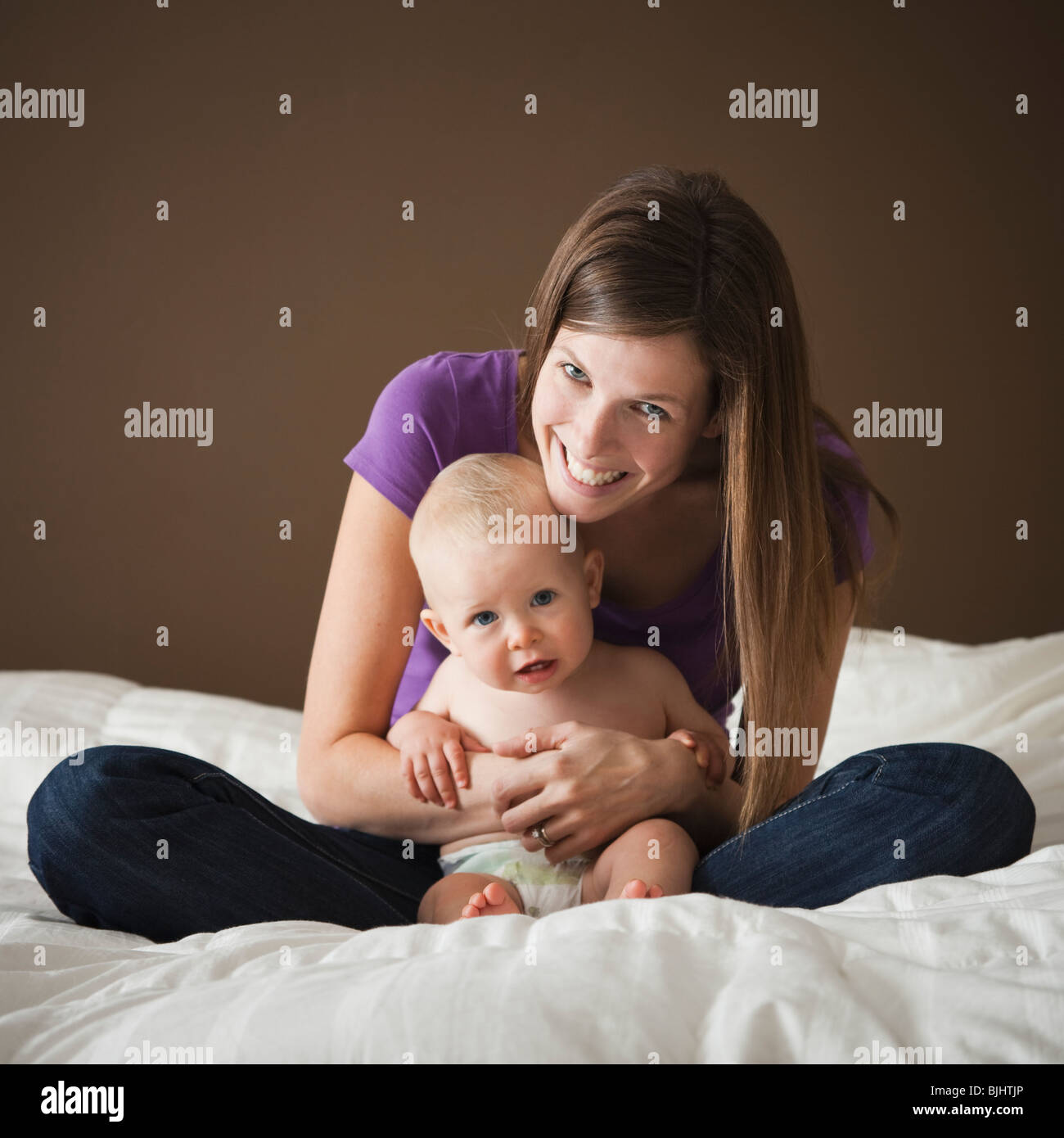 Woman and baby Stock Photo - Alamy