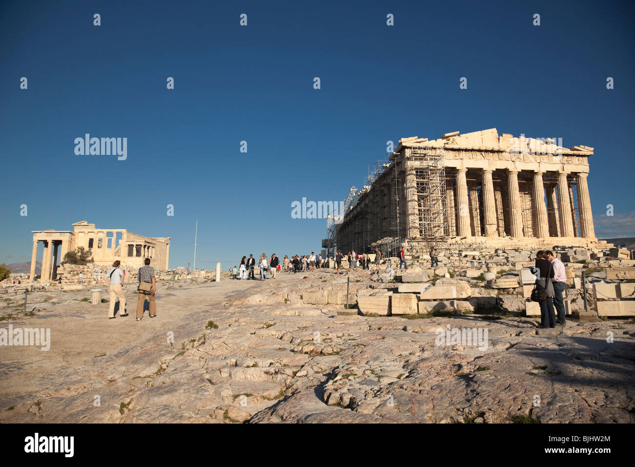Tourists visit Parthenon on Acropolis in Athens Stock Photo - Alamy