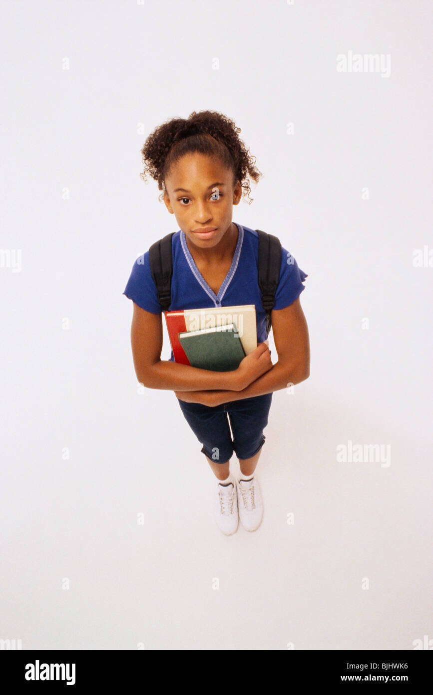 Student holding books Stock Photo - Alamy