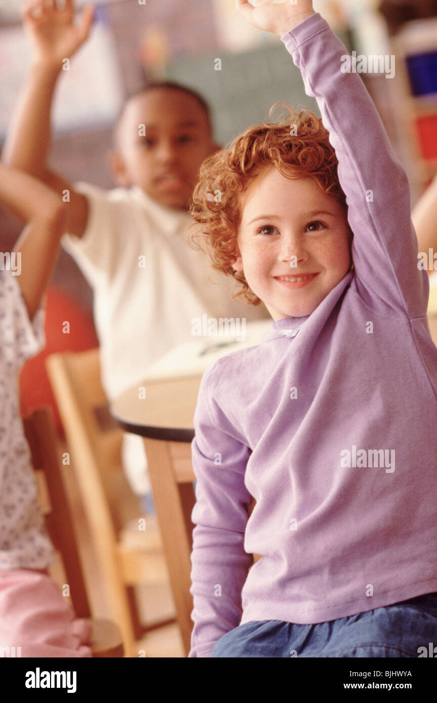 Hands up classroom hi-res stock photography and images - Alamy