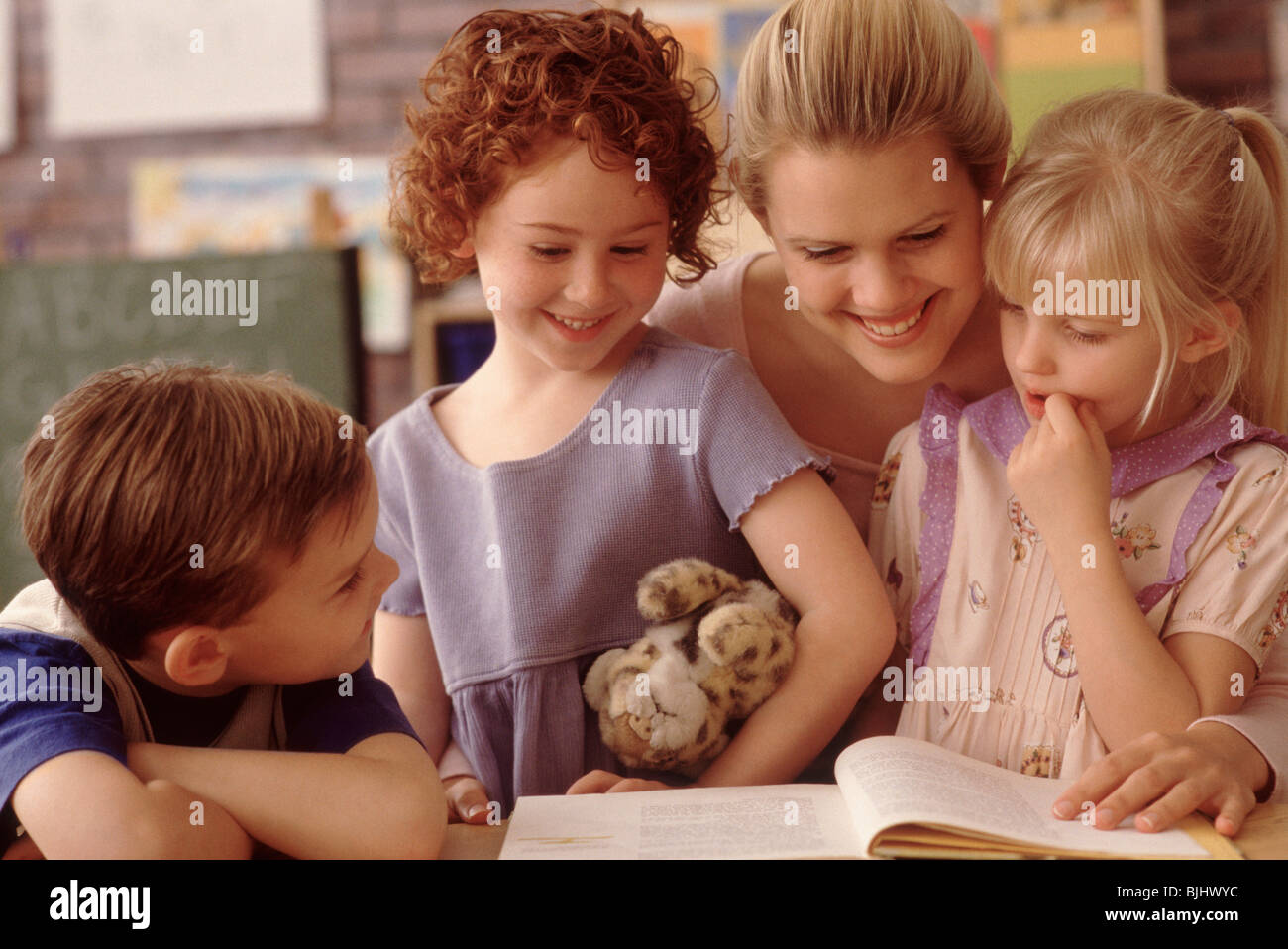 Group of children in classroom Stock Photo - Alamy