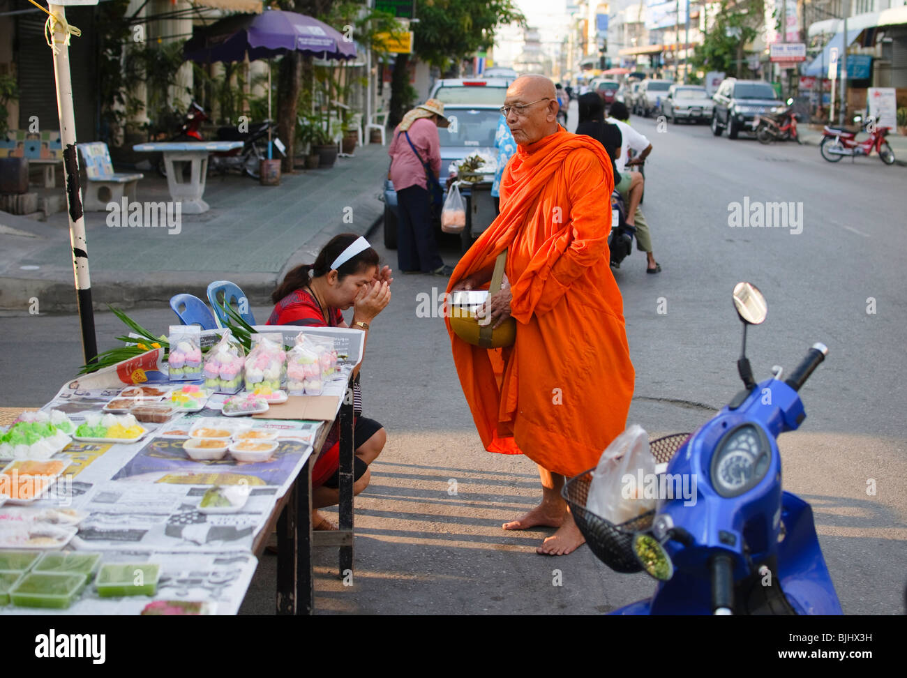 Monk with alms hi-res stock photography and images - Alamy
